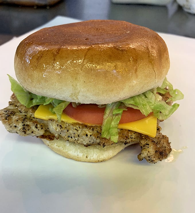 Burger purists, rejoice! This isn't some trendy, overwrought creation—it's the platonic ideal of what happens when beef meets bun meets simple, perfect toppings.