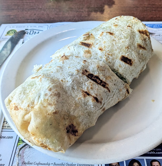 The breakfast burrito—where morning meets afternoon in a hand-held package of joy. Grilled to perfection and ready for its close-up.