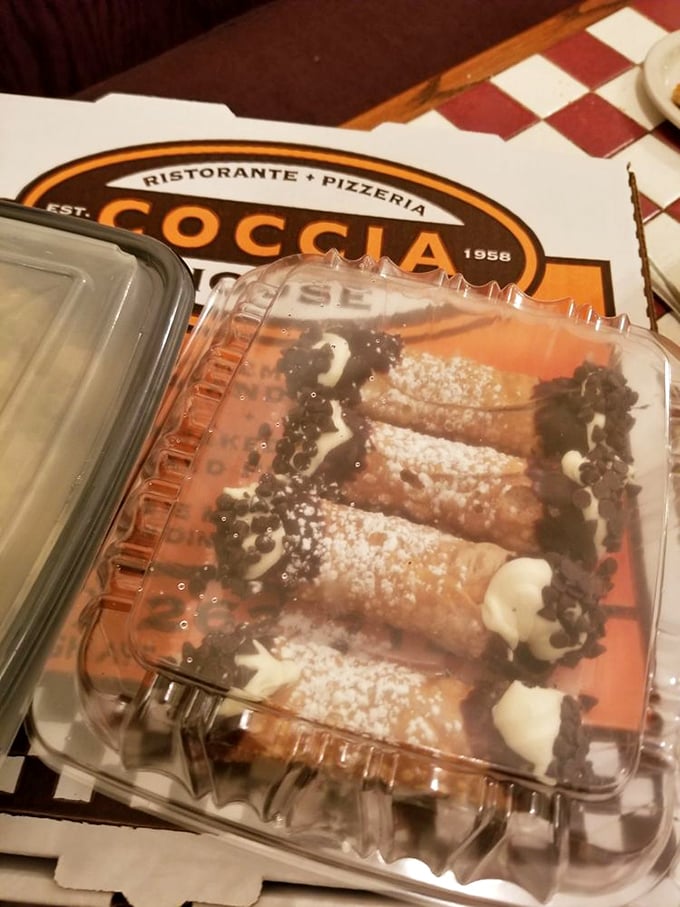Cannoli shells so crispy they shatter like delicious glass, filled with cream that dreams are made of.
