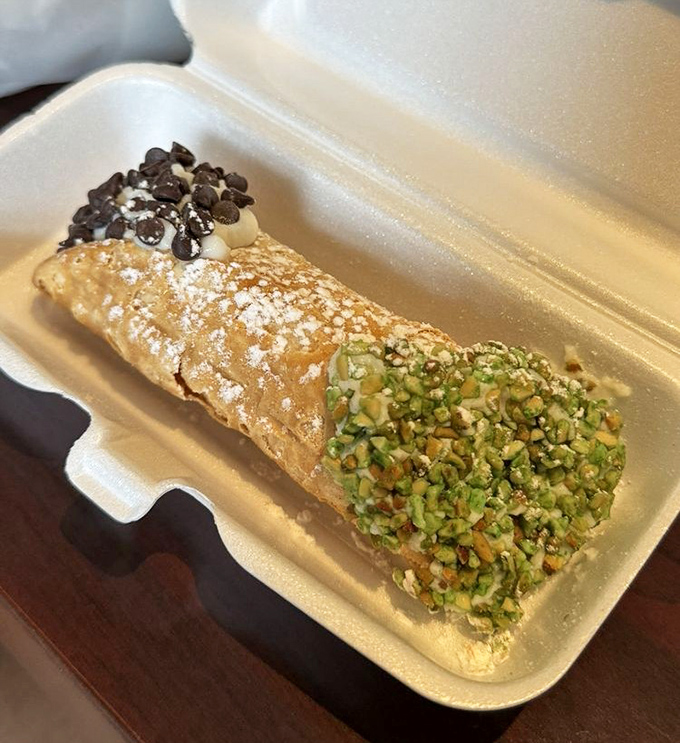 The cannoli provides sweet closure to your beef adventure—crisp shell, creamy filling, and those pistachios adding textural magic.