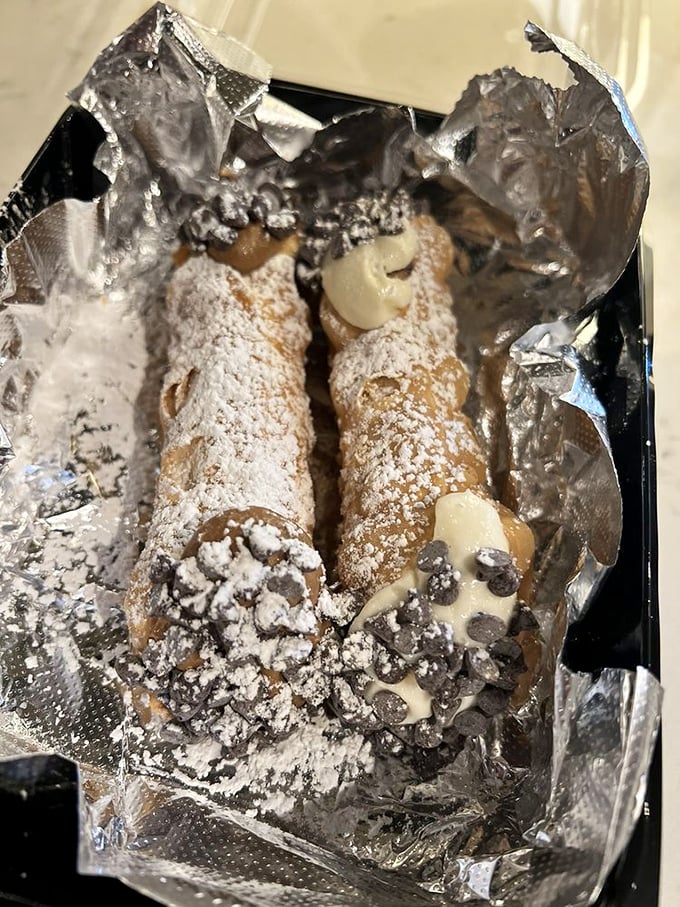 Cannoli that would make any Sicilian grandmother nod in approval. Those chocolate-dipped ends are pure genius.
