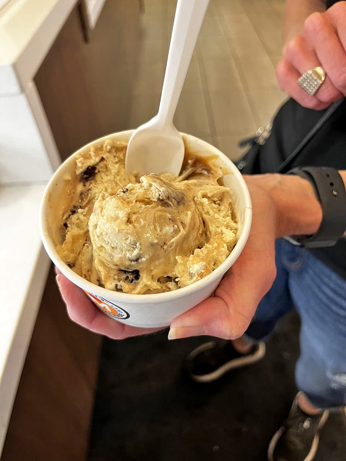 Caramel and chocolate unite in this cup of comfort—like a warm hug from your favorite aunt, only colder and with fewer questions about your love life.
