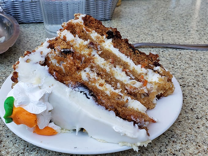 Carrot cake that doesn't just have layers—it has chapters, each one more moist and decadent than the last.