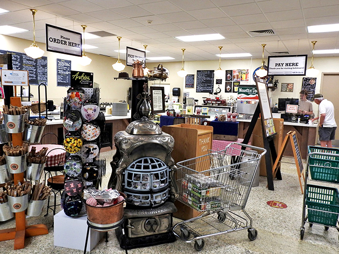 The heart of the store features a vintage potbelly stove, surrounded by kitchen gadgets that grandmother would recognize instantly.