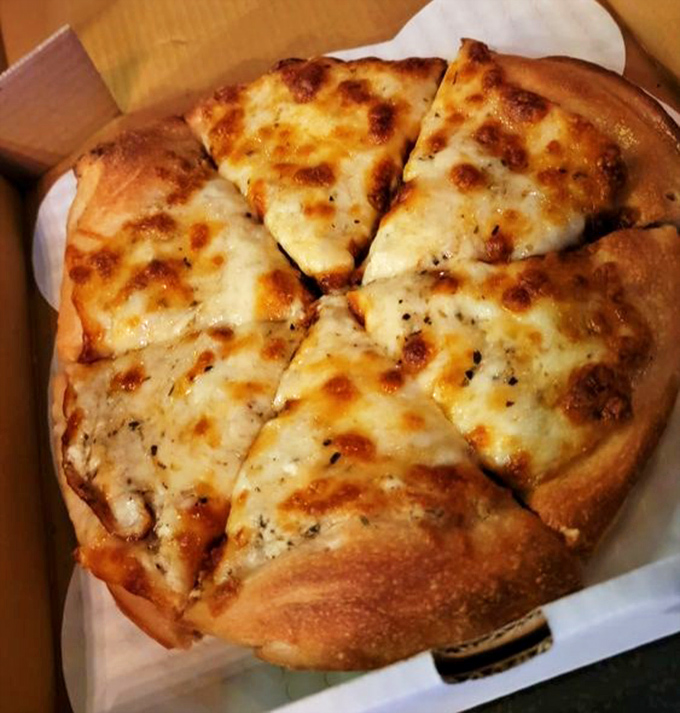 Sometimes simplicity is revolutionary. This cheese pizza proves you don't need fancy toppings when the basics are executed flawlessly.