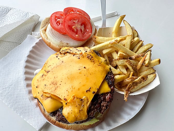 A burger that deserves its own ZIP code. That melted cheese blanket and those fresh toppings are the stuff of late-night cravings.