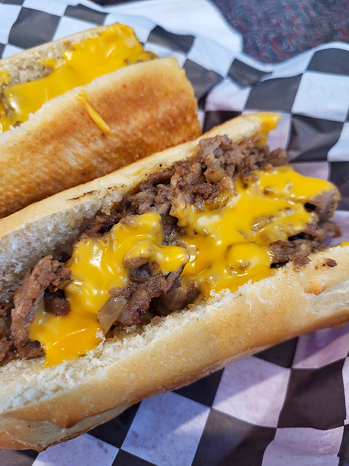 Behold the cheeseburger sub—where two American classics collide in a glorious avalanche of melted cheese and seasoned beef.