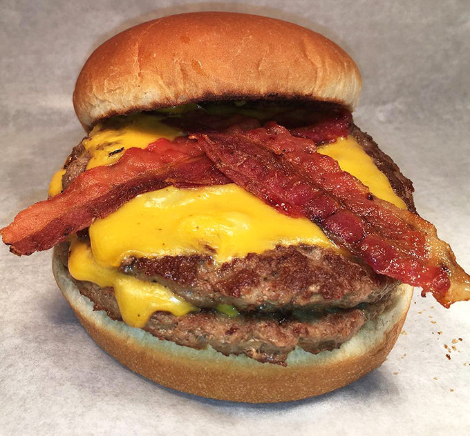Behold the double bacon cheeseburger—where beef meets cheese meets bacon in a summit more productive than most political ones.