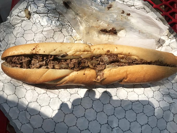 A proper Philly cheesesteak on a roll that knows its supporting role—sturdy enough to hold the filling, tender enough not to fight it.