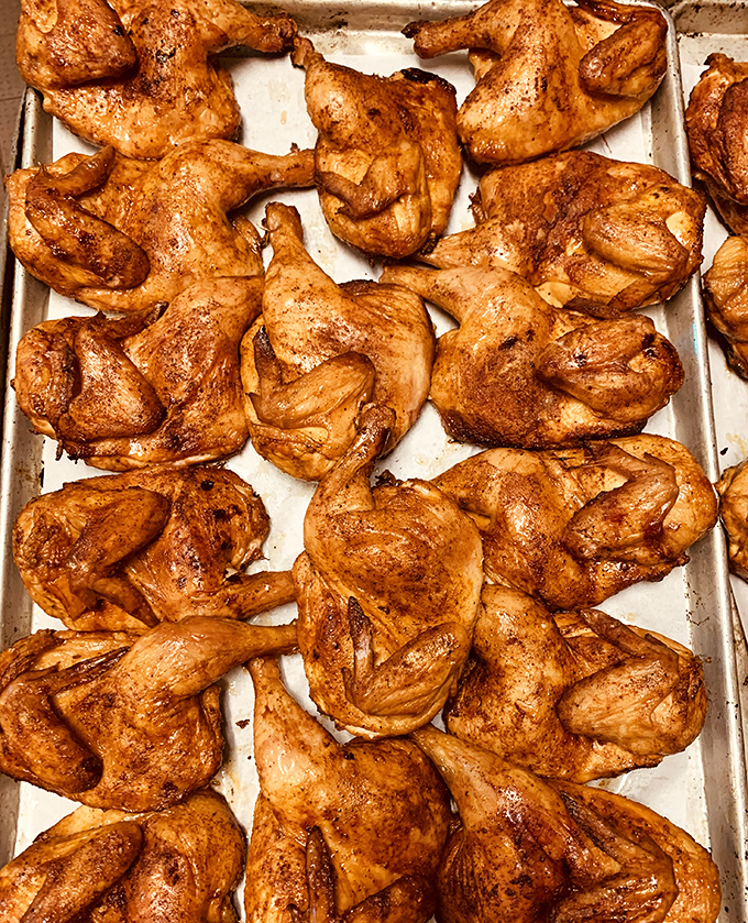 These smoked chicken quarters aren't just cooked – they're transformed. That burnished skin is nature's candy for carnivores.