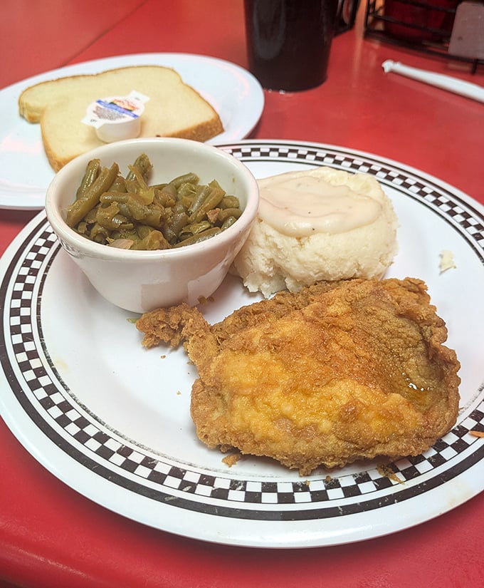 Country-fried steak with that perfect golden crust, served with green beans and mashed potatoes – the holy trinity of comfort food done right.