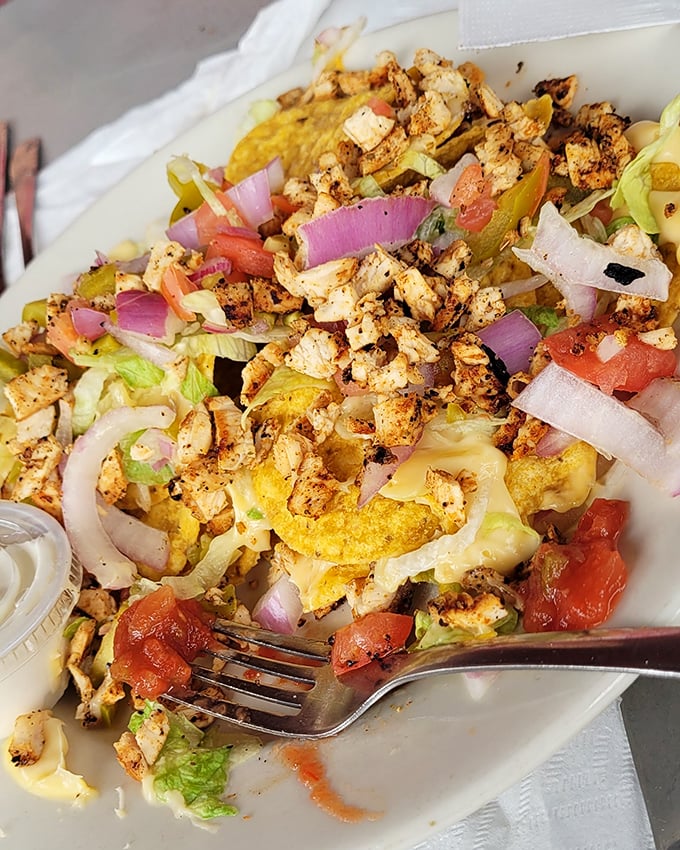 A salad that doesn't know it's a salad – loaded with seasoned chicken, fresh veggies, and enough flavor to make you forget you're eating something healthy.