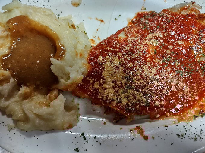 Chicken Parmesan with a blanket of marinara and melted cheese that stretches for days. Comfort food that whispers, "Diet? What diet?"