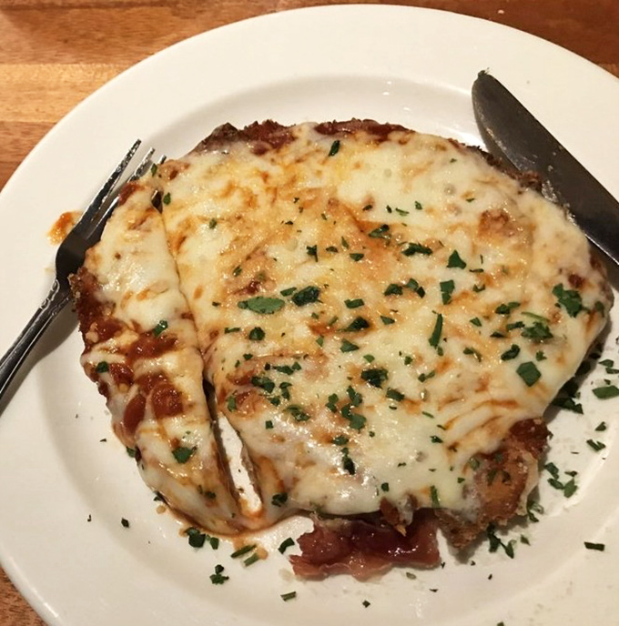 Chicken parmigiana that's dressed better than most of us on date night—crispy, cheesy, and absolutely ready for its close-up.