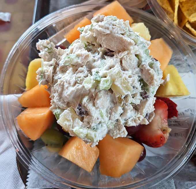 Fresh fruit and homemade chicken salad – proof that Ivanhoe's isn't just about indulgence, but knows balance too. Summer on a plate.