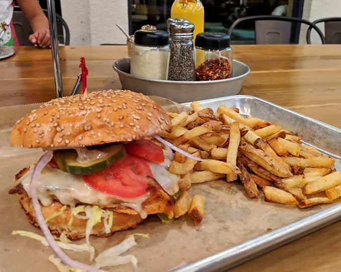A proper sandwich should require both hands and a strategy. This masterpiece demands respect, napkins, and possibly a thank-you note.