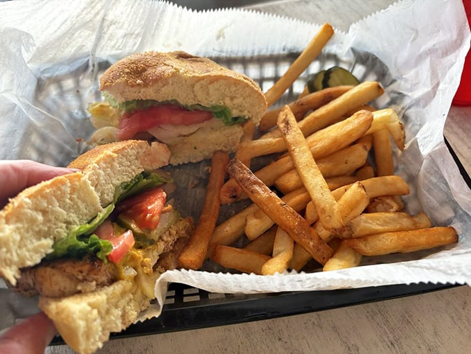 A sandwich that doesn't need Instagram filters—just honest ingredients stacked between bread with fries that didn't come from a freezer bag. Simple perfection.