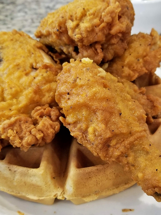 When chicken met waffle, angels wept – this crispy-meets-fluffy union defies all breakfast logic beautifully.