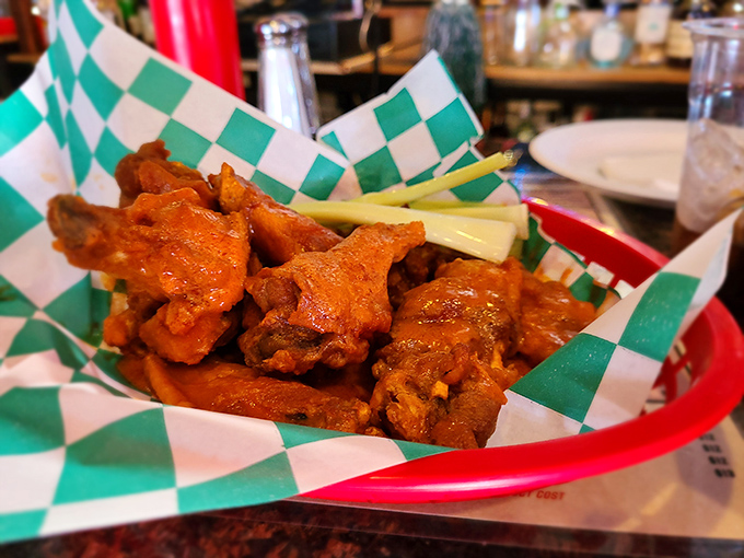These wings aren't messing around – vibrant, saucy, and demanding your full attention. The celery is just there for moral support.