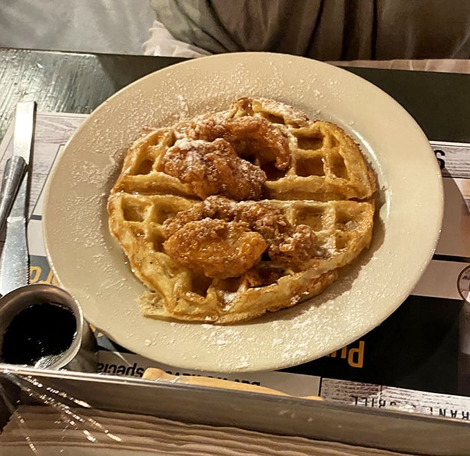The chicken and waffle alliance continues to prove that breakfast and dinner belong together—especially when powdered sugar is involved.