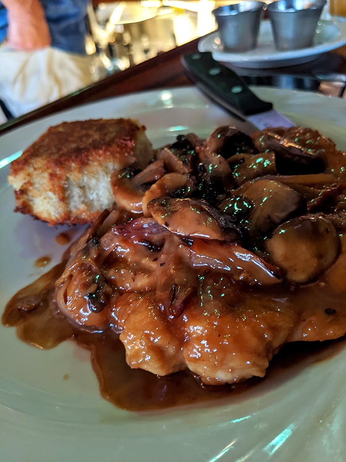 Chicken Marsala swimming in a rich mushroom sauce – proof that not everything delicious at Harbor Hut comes from the sea.