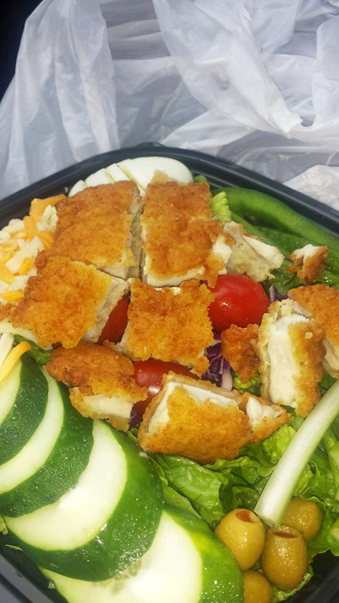 Even salads get the royal treatment here. Those crispy chicken pieces are like the surprise guest stars that steal the whole show.