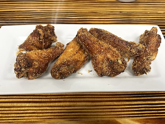 These wings aren't just crispy – they're practically auditioning for their own cooking show. The golden-brown coating promises a flavor explosion with each bite.