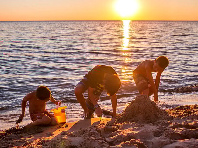 Sandcastle architects at work, creating ephemeral masterpieces that will be reclaimed by the tide but live forever in family memories.