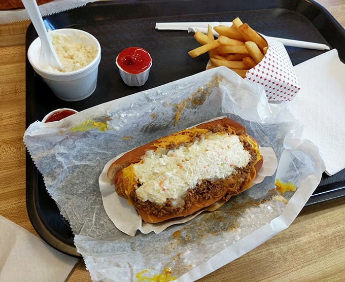 The chili cheese dog arrives like an old friend – familiar, comforting, and absolutely worth the napkins you'll sacrifice to the food gods.