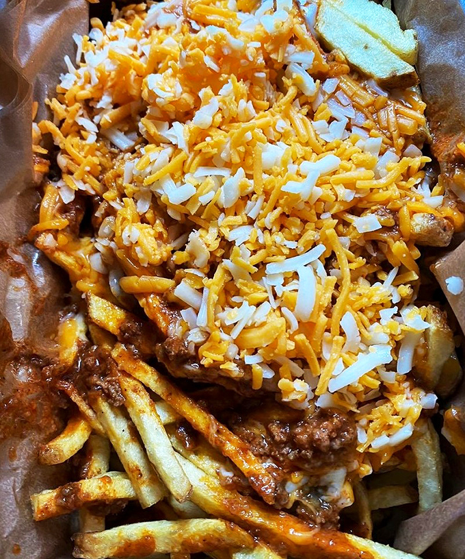 Chili cheese fries that require both fork and commitment – a glorious mess that satisfies something primal in the human spirit.