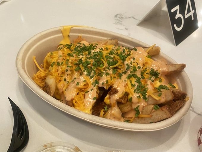 Loaded fries that require both a fork and a moment of silent appreciation. The cheese-to-chili ratio here deserves a mathematical study.
