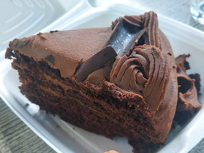 "Death by Chocolate" isn't just a name—it's a prophecy. Dense, rich layers of cake and frosting that make diets disappear faster than magic.