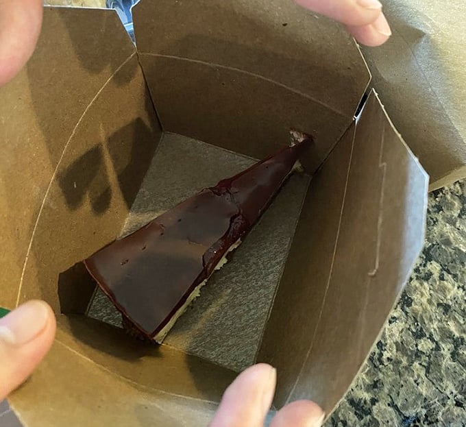 When chocolate cake gets a to-go box, it's not leftovers – it's tomorrow's breakfast making a preemptive journey home.