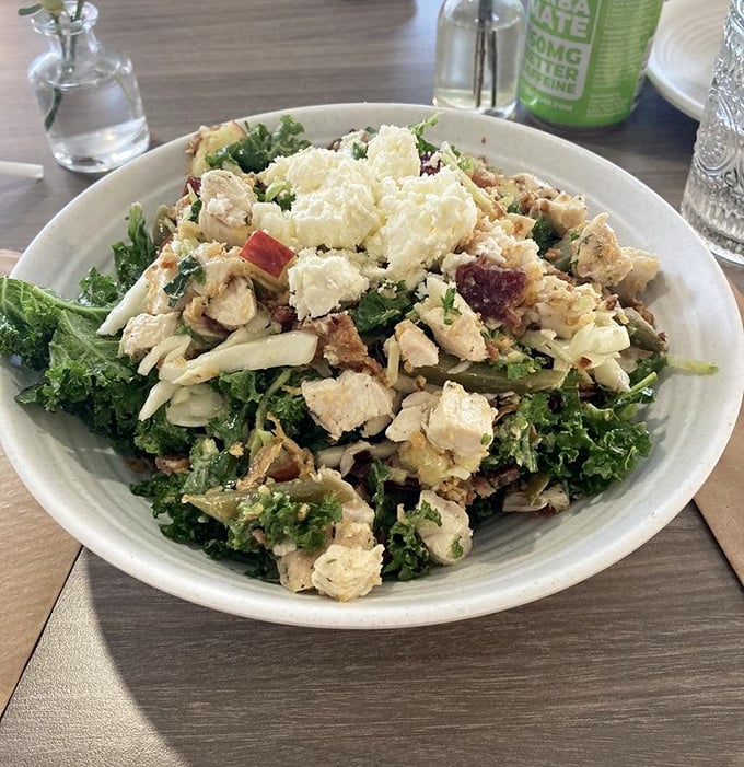 A kale chicken salad that makes you forget you're eating something healthy—like sneaking vegetables into a child's meal, except you're the child.