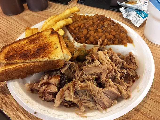 A trifecta of Southern comfort—pulled pork, baked beans, and toast. Simple pleasures that remind you why classics became classics.
