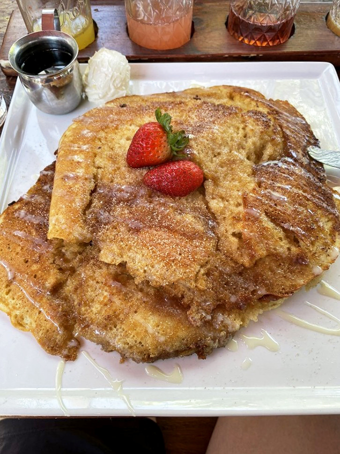 These pancakes don't just satisfy hunger—they fulfill childhood dreams you didn't know you still had. The strawberries are just showing off.