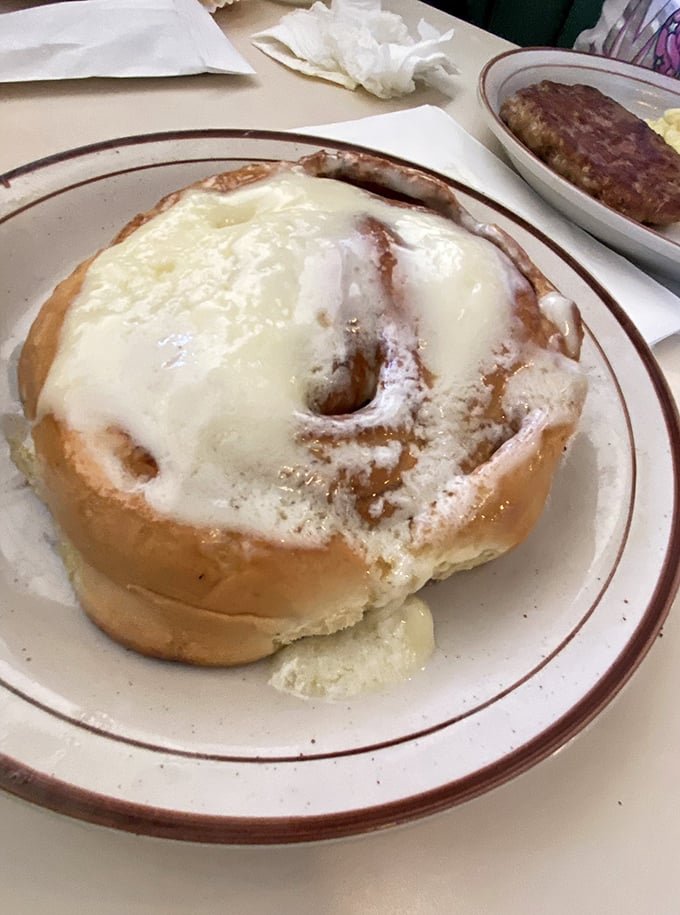 This cinnamon roll isn't just dessert disguised as breakfast—it's a warm hug on a plate.