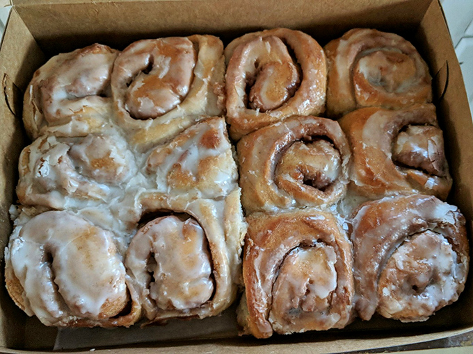 Cinnamon rolls that could make a carb-counter weep with joy. That glaze isn't just icing—it's liquid happiness drizzled over pillowy perfection.