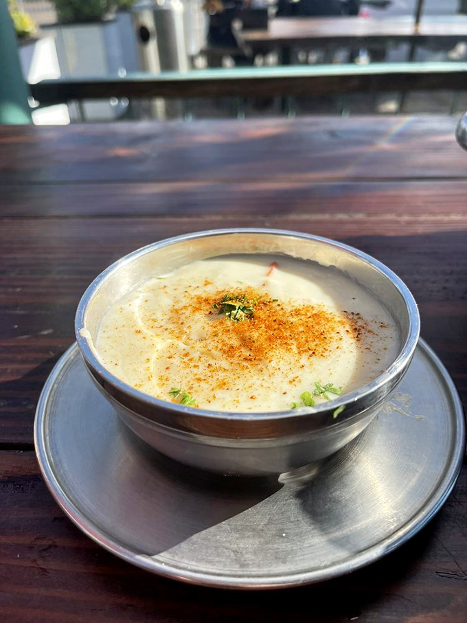 Clam chowder that doesn't hide behind excessive cream. Each spoonful is like the ocean decided to hug your taste buds.