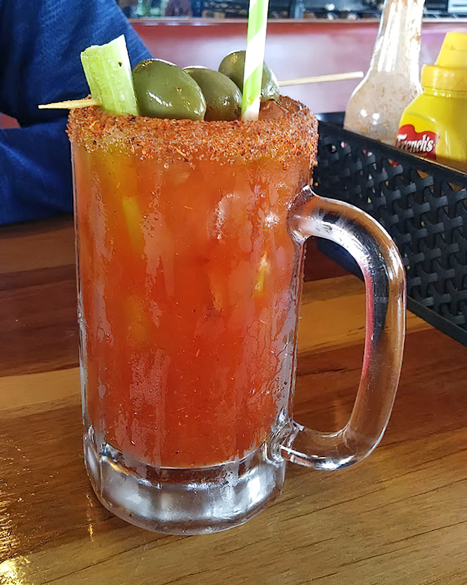 That Bloody Mary isn't just a drink—it's a meal with a buzz. Those olives are practically begging you to start your weekend right.