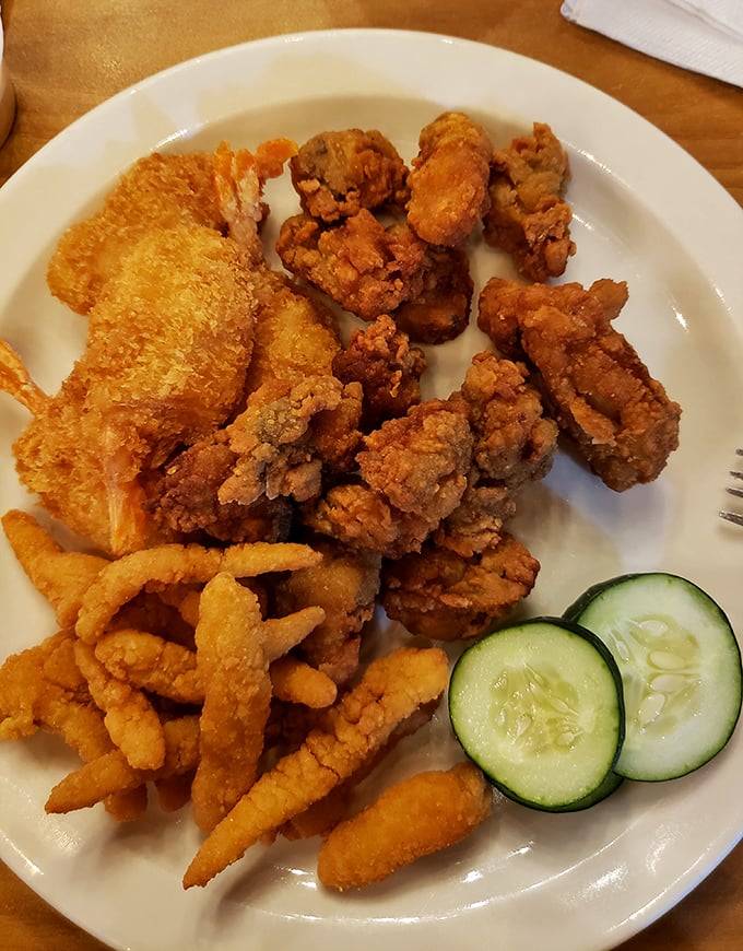 A seafood sampler that would make Neptune himself nod in approval – crispy, golden morsels arranged like edible jewelry.
