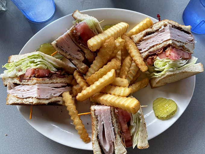 The club sandwich: architectural marvel of the diner world. Stacked higher than some LA apartments and infinitely more satisfying.