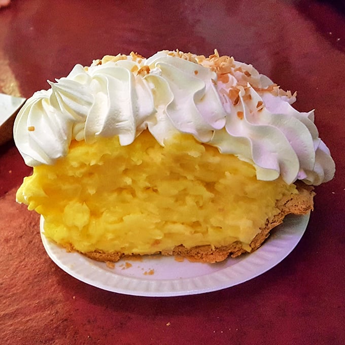 Coconut cream pie that's sunshine on a plate – the kind of dessert that makes you contemplate ordering a second slice before finishing the first.