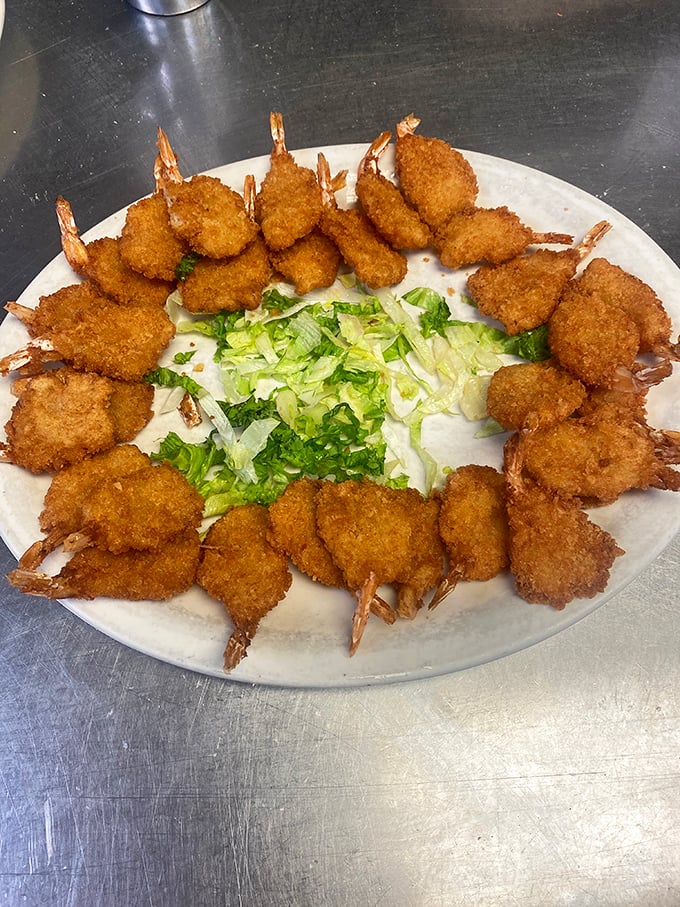 Coconut shrimp arranged in a perfect circle—like a crispy seafood sundial marking the time until your next bite.