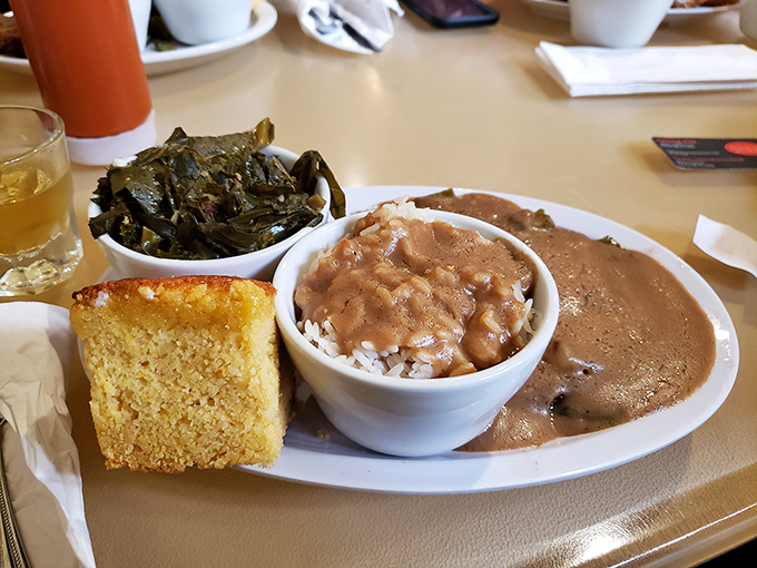 These aren't just collard greens—they're a Southern heirloom served with cornbread that could make your grandmother question her own recipe.