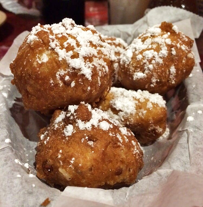These corn fritters dusted with powdered sugar are what would happen if a hushpuppy went to pastry school – crispy, sweet little clouds of joy.