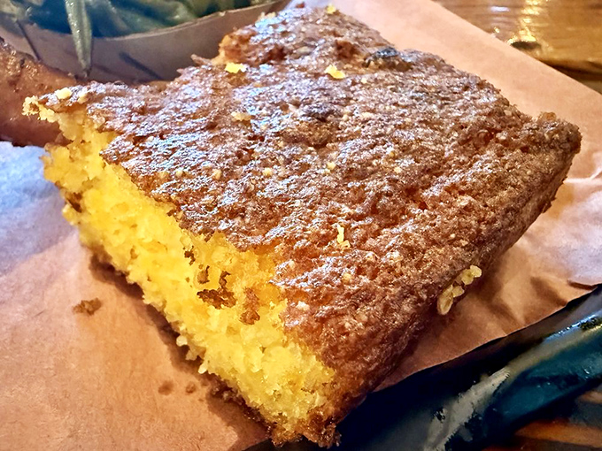 Cornbread so perfectly golden and crumbly, it makes you wonder if it's acceptable to skip the barbecue and just order three pieces of this instead.