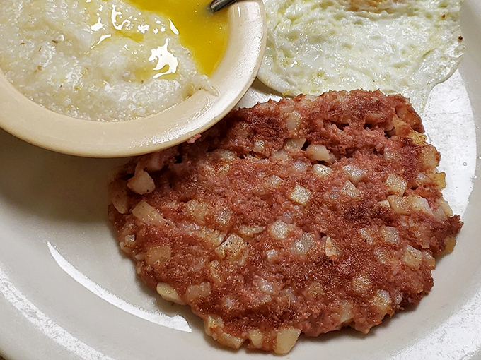 Crispy corned beef hash with eggs—the kind of breakfast that makes you wonder why you'd ever waste time on a green smoothie.