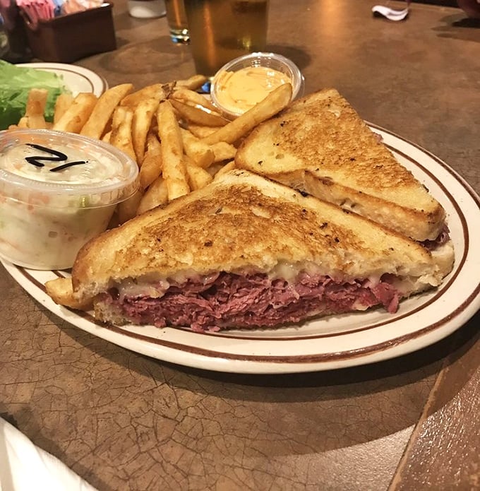 A reuben sandwich that doesn't mess around—tender corned beef stacked high between grilled rye with just enough tang to make your mouth dance.