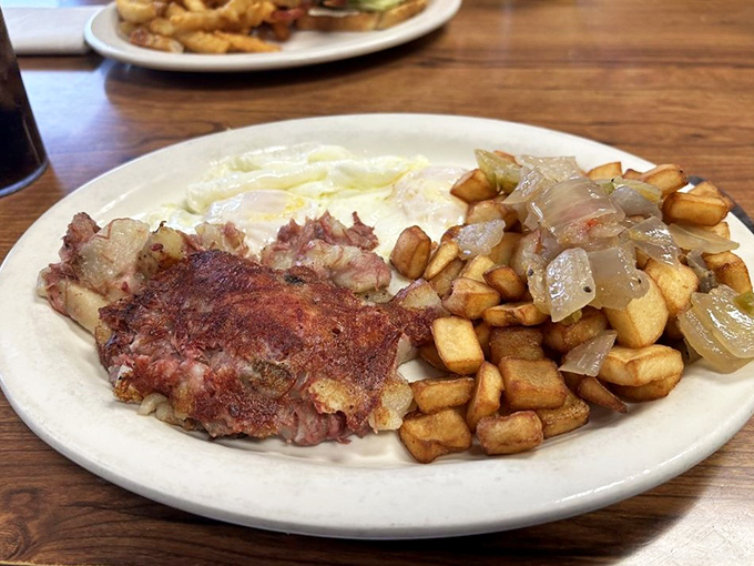 Breakfast of champions – crispy hash browns, eggs, and meat that fuel Indianapolis from construction workers to corporate executives alike.